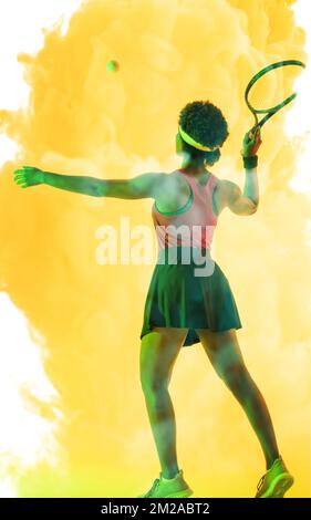 Rear view of american football player in 21 number jersey with ball and ...