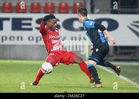 Club's Dion Cools and Essevee's Kingsley Madu fight for the ball during ...