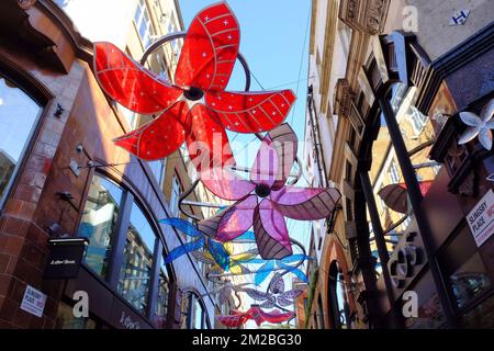 Large colourful flower artwork across Slingsby Place, Covent Garden ...