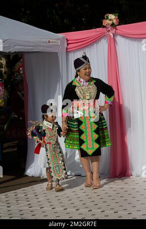 Teens and children model modernized Hmong outfits at a fashion show ...