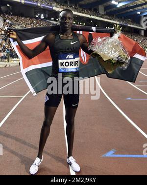 Emmanuel Korir, of Kenya, celebrates after winning the final of the men ...