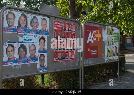 Illustration shows posters for upcoming local elections, near the city ...