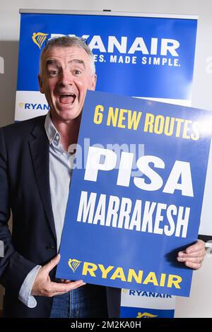 Ryanair CEO Michael O'Leary poses with a slogan at a press conference ...