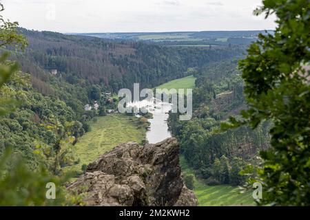 The Berounka river between mountains covered in forests in the Czech ...
