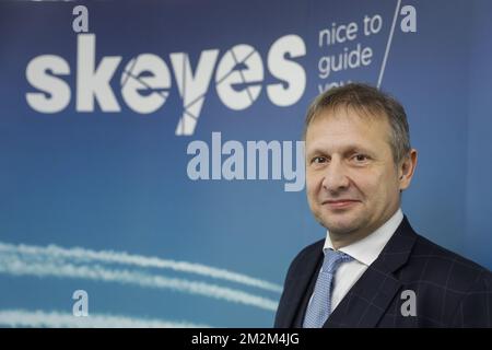 Belgocontrol CEO Johan Decuyper poses with the 'skeyes' logo, the new ...