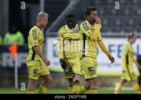 Lokeren's players look dejected during a soccer match between KAS Eupen ...