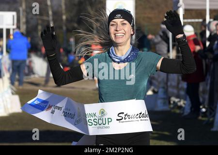 Polish Anna Gosk celebrates as she crosses the finish line to win the ...