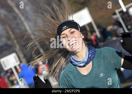Polish Anna Gosk celebrates as she crosses the finish line to win the ...