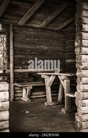 An interior of pavilion with wooden table and seats Stock Photo - Alamy