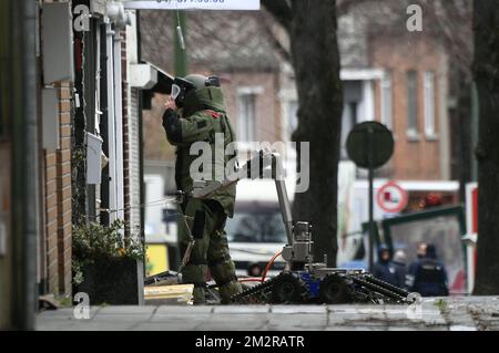 Illustration shows an explosives team with robot in action on the scene ...