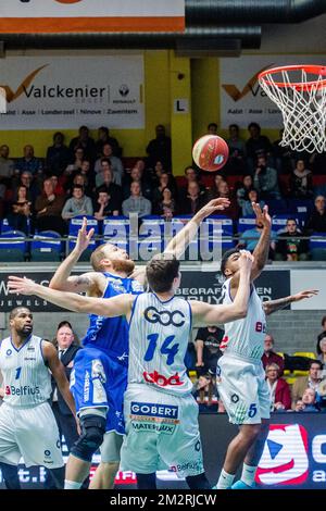 players fight for the ball during the basketball game between Port of ...