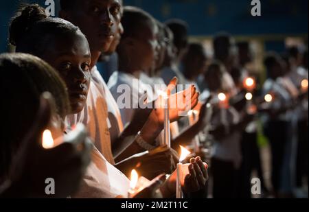Illustration picture shows young Rwandese with candles during a vigil ...