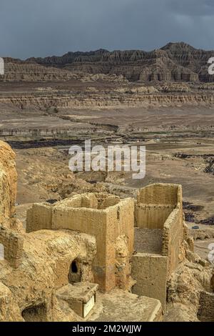 The ruins of the historic Guge Kingdom with destroyed walls and ...