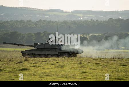 commander and gunner directing action in a British army FV4034 ...