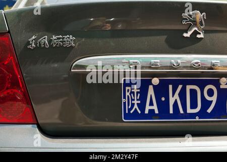 Rear with numberplate and model written in Chinese characters / writing ...