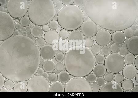 Drops of fat in water. Bubbles of fat close up.Oil Stock Photo - Alamy