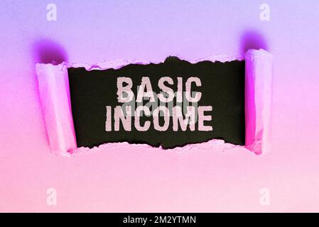 Hand writing sign Basic Income. Internet Concept periodic cash payment ...