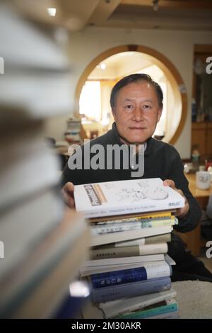 Chinese writer Qi Yimin poses for a photo in Beijing, China, on ...