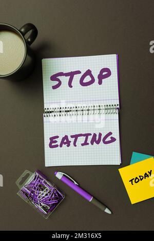 Text showing inspiration Stop Eating. Concept meaning cease the ...
