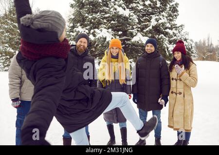 Winter, holidays and people concept - cheerful young woman is happy to ...