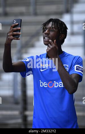 Genk's Pierre Dwomoh takes a selfie picture with a mobile phone, during ...