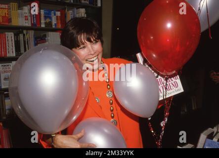 Neile McQueen Toffel promoting her book, My Husband, My Friend in 1986 ...