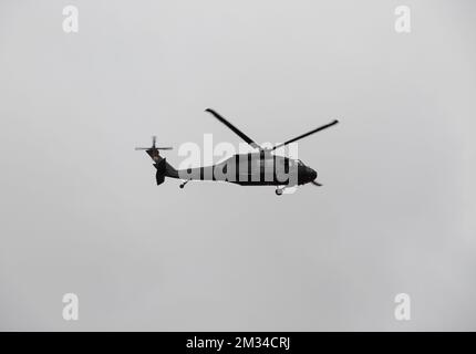 police black hawk helicopter flying over crow during colombian ...