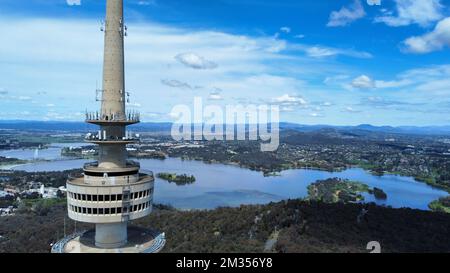 A bird's eye view shot of a Telstra Tower in Canberra with a background ...