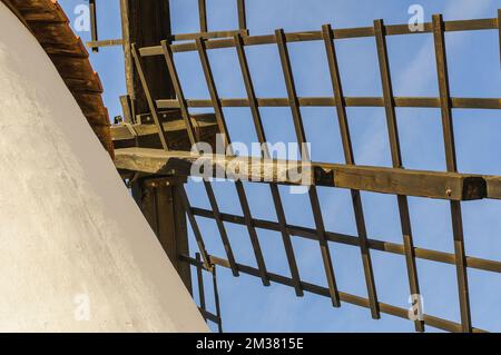 A closeup shot of a medieval windmill on a blue sky background - Spain ...