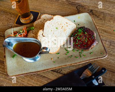 Popular dish of Dutch cuisine is the kogel steak (dikbil Stock Photo ...