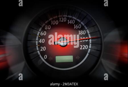 The speedometer of a modern car shows a high driving speed Stock Photo ...