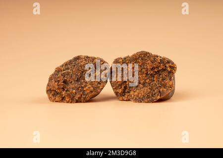 brown broken piece of cannabis concentrate hashish isolated on white ...