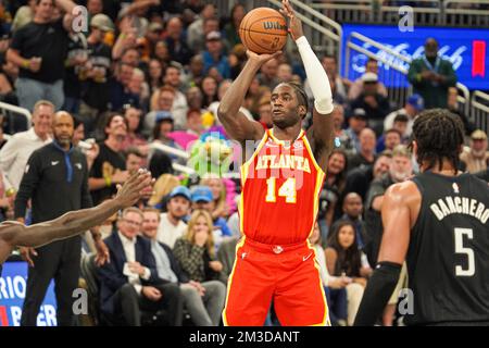 Atlanta Hawks' AJ Griffin shoots past Milwaukee Bucks' George Hill ...