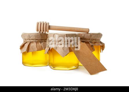 Honey bonbonnieres and dipper on white background Stock Photo - Alamy