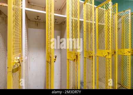 Old yellow metal gym, gymnasium, lockers with an old locker room Stock ...