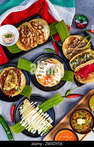 Tacos with sauces on grey background top view closeup Stock Photo - Alamy
