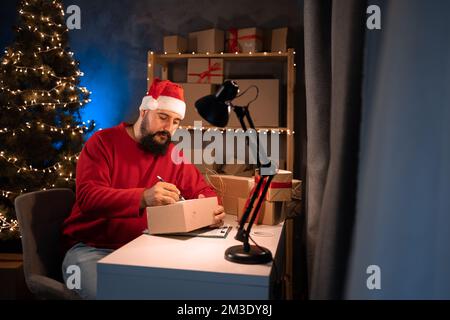 small business owner hindu freelance santa working at home office using ...