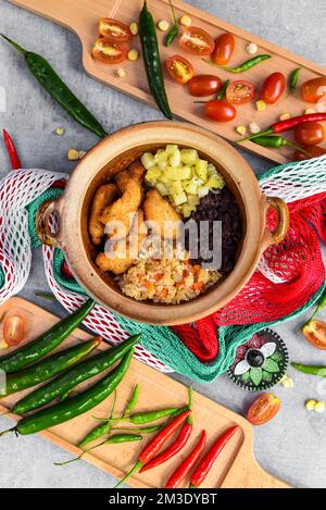 Mexican tradition dish Cazuela with fried chicken, beans rice and ...