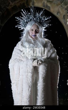 An actor playing the role of the Snow Queen, during a photo call for ...