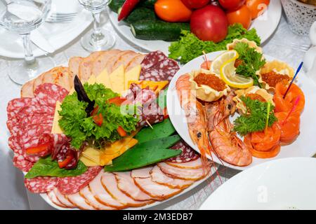 cold fish snacks on the festive table Stock Photo - Alamy