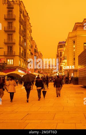 A street is covered in sand as a storm approaches, Saturday, Oct. 11 ...