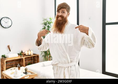 Redhead man with long beard wearing casual clothes with a happy and ...