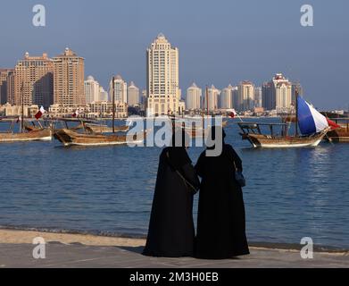 Doha, Qatar, 15th November 2022. A Qatar flag is carried aboard a local ...