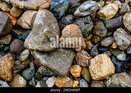 Closeup view at pebbles on the shore Stock Photo - Alamy