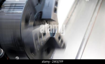 Rotating Metal machine with drum. Media. Rotating round part in ...
