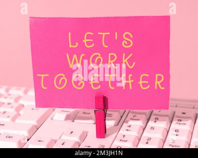 Hand writing sign Let's Work Together, Business showcase Unite and Join ...