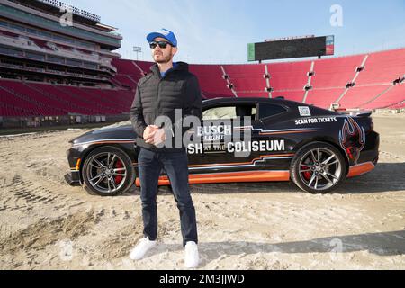 Kyle Larson poses with Chevrolet pace car during 2023 Busch Light Clash ...