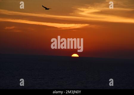 General view of the sunset on the heavenly Mazunte beach, a beautiful ...