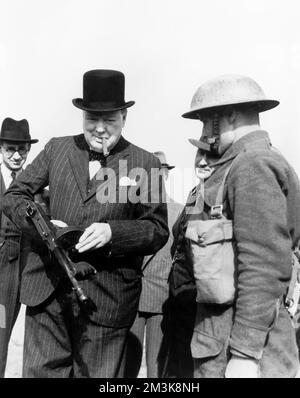 Winston Churchill Holding a Sub-Machine Gun Stock Photo - Alamy