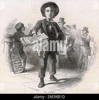 Boy selling newspapers on street, New York City Stock Photo - Alamy